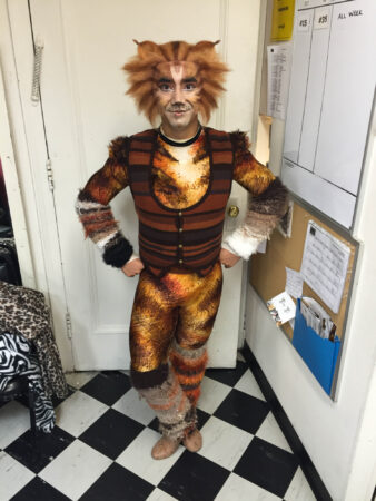 See Aaron Albano Swing as 7 Different Broadway Cats | Playbill